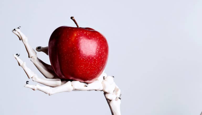 apple-in-skeleton-hand_1600 - Futurity